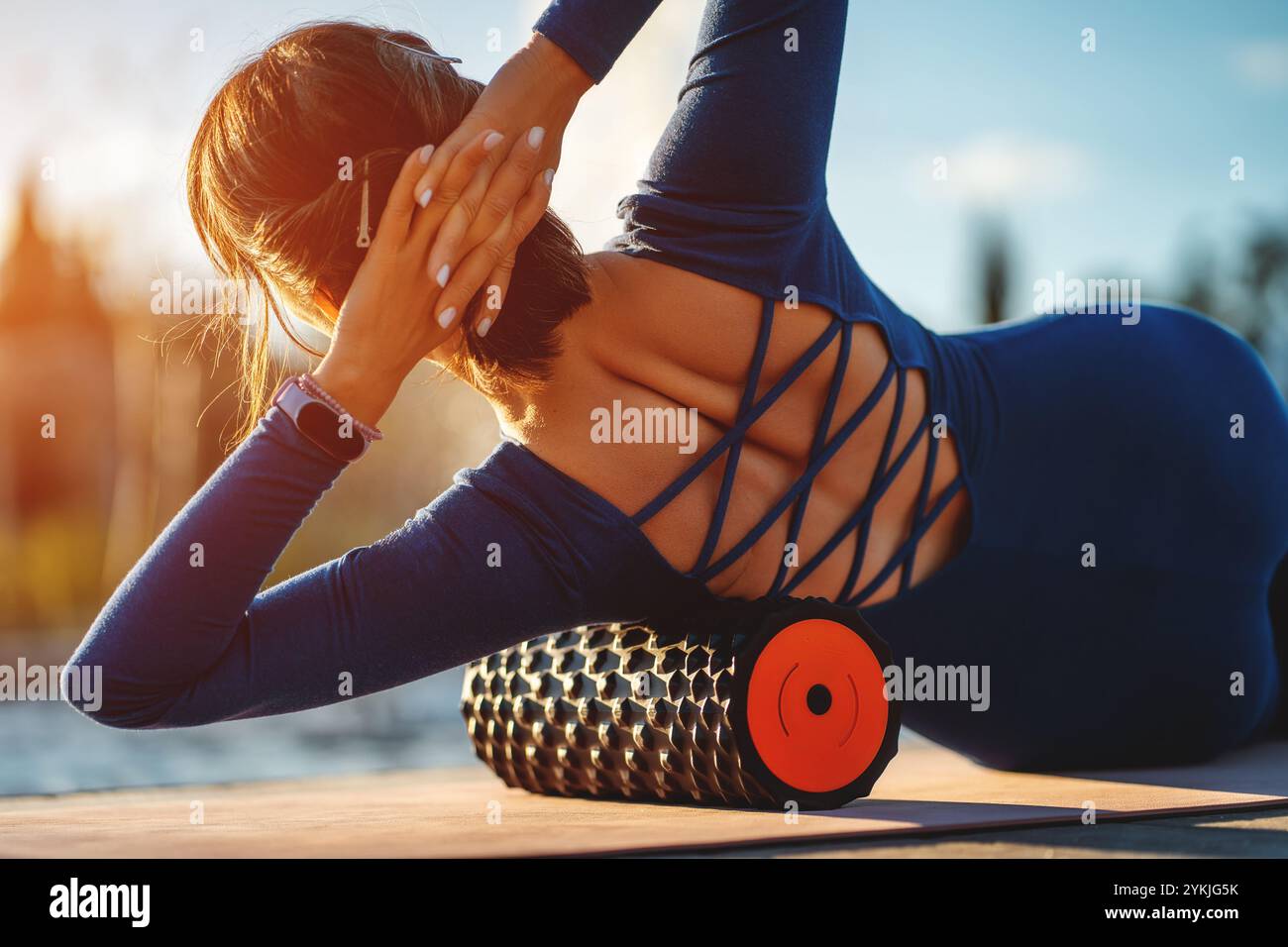 active fitness woman practicing muscular relaxation exercise with ...