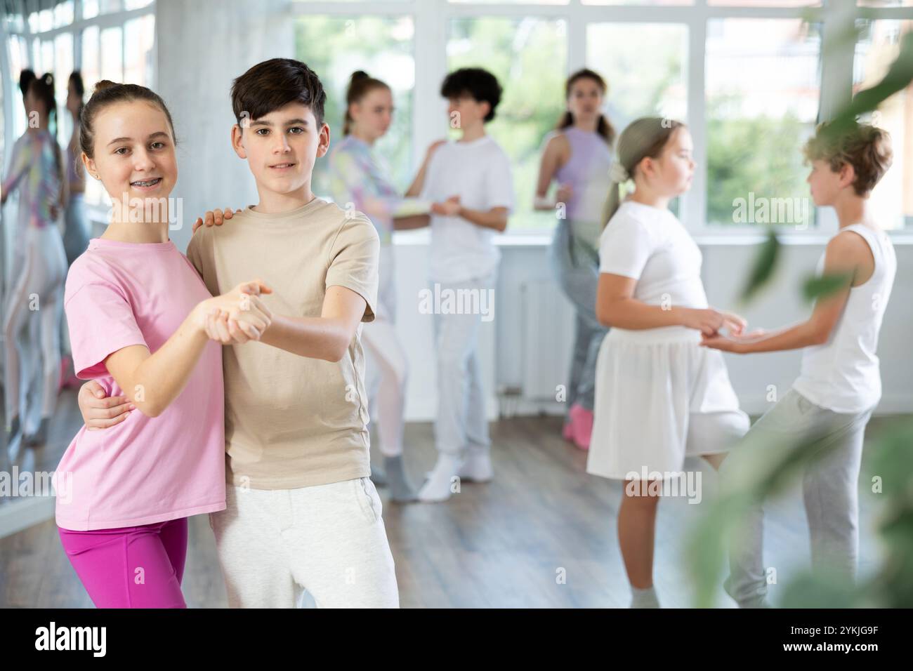 Boy and girl dancing couples dance Stock Photo - Alamy