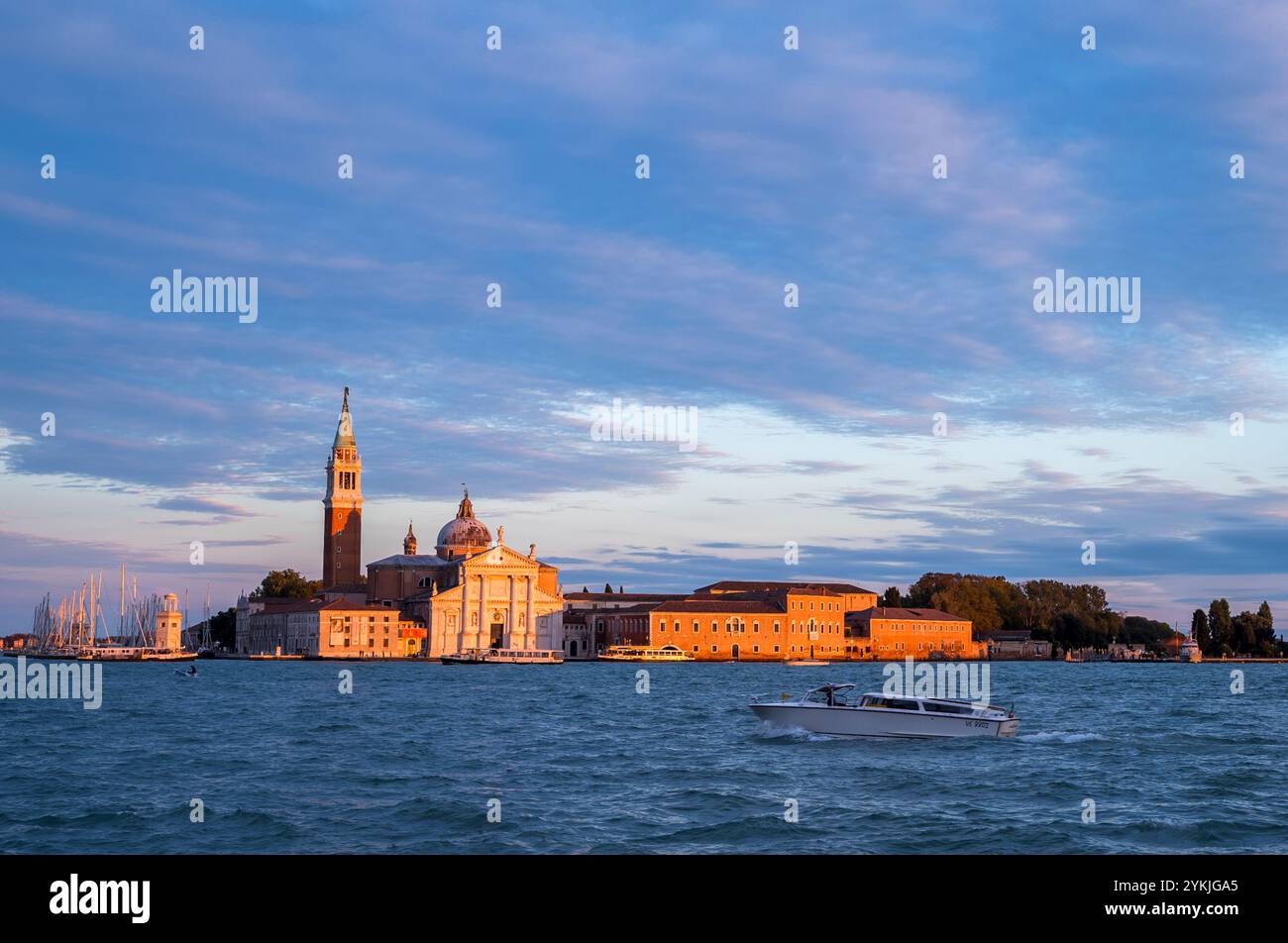 View to Basilica di San Pietro di Castello with water taxi in Venice ...