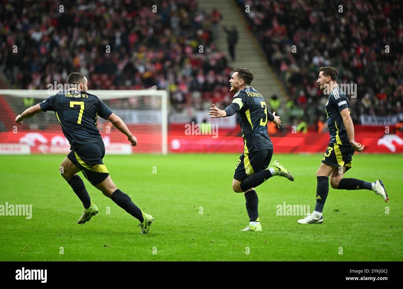 Scotland's Andrew Robertson celebrates scoring their side's second goal ...