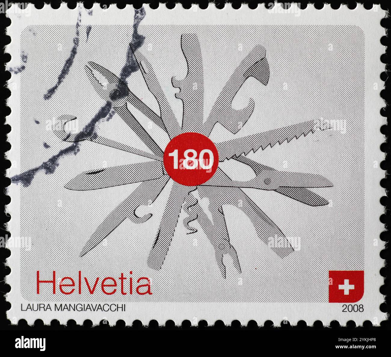 Tools of Swiss Army knife on postage stamp Stock Photo - Alamy