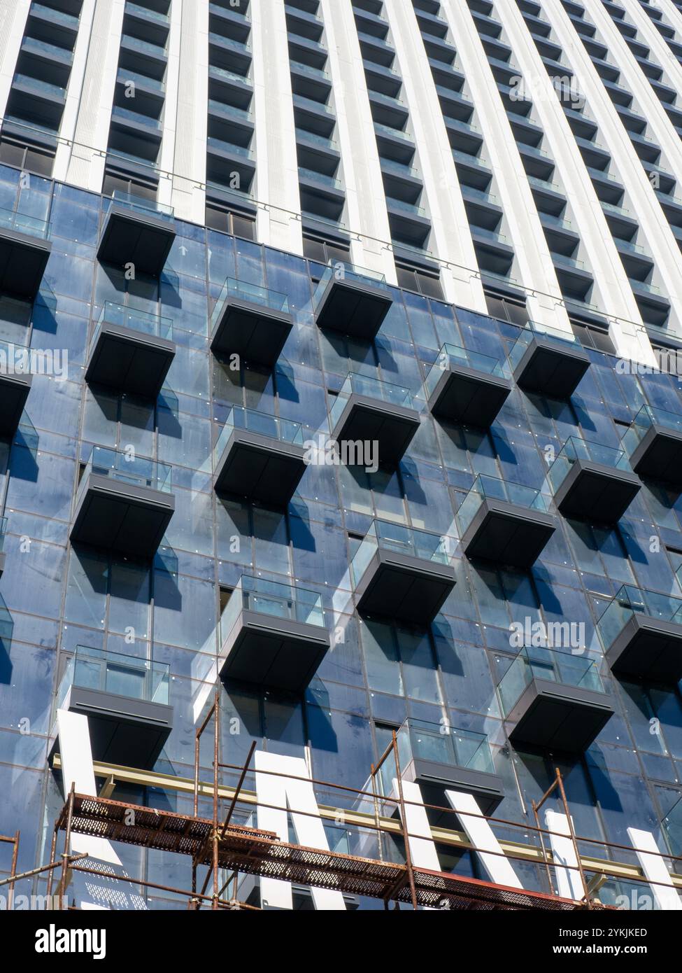 Facade of a modern multi-storey building. Balconies of a high-rise ...