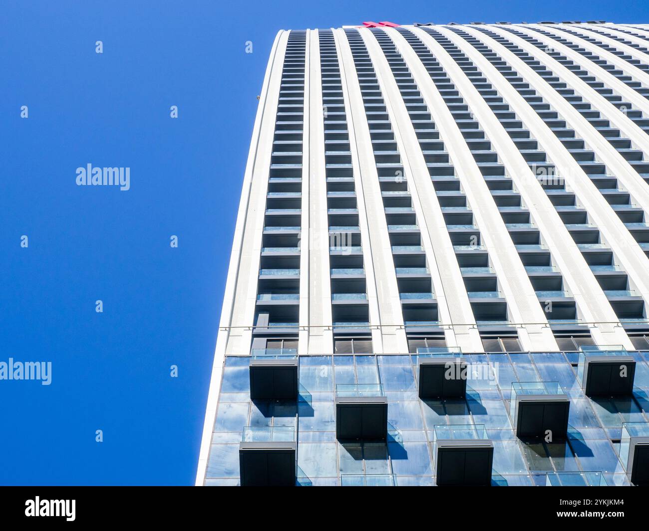 Facade of a modern multi-storey building. Balconies of a high-rise ...