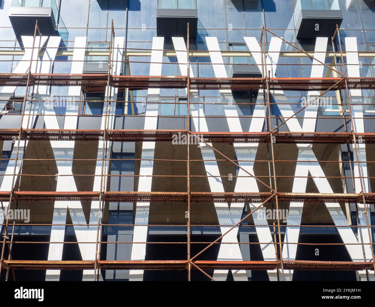 Facade of a modern multi-storey building. Balconies of a high-rise ...