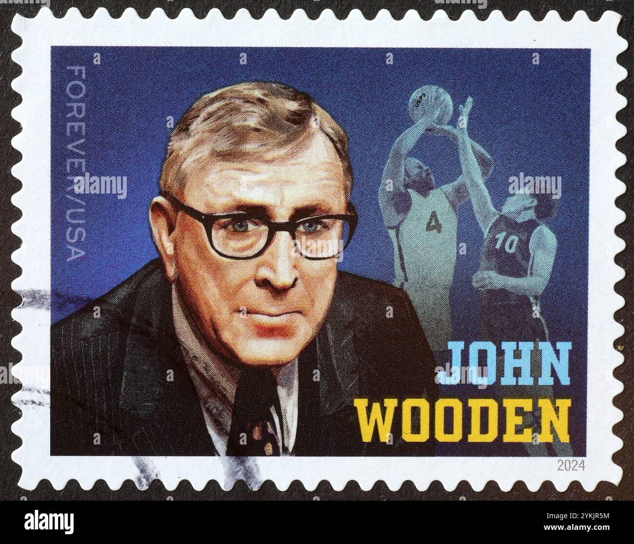 American basketball coach john Wooden on postage stamp Stock Photo - Alamy