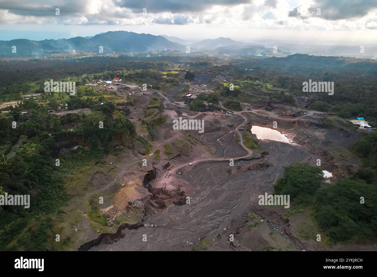 A beautiful valley under an active volcano. An old river made of ash ...