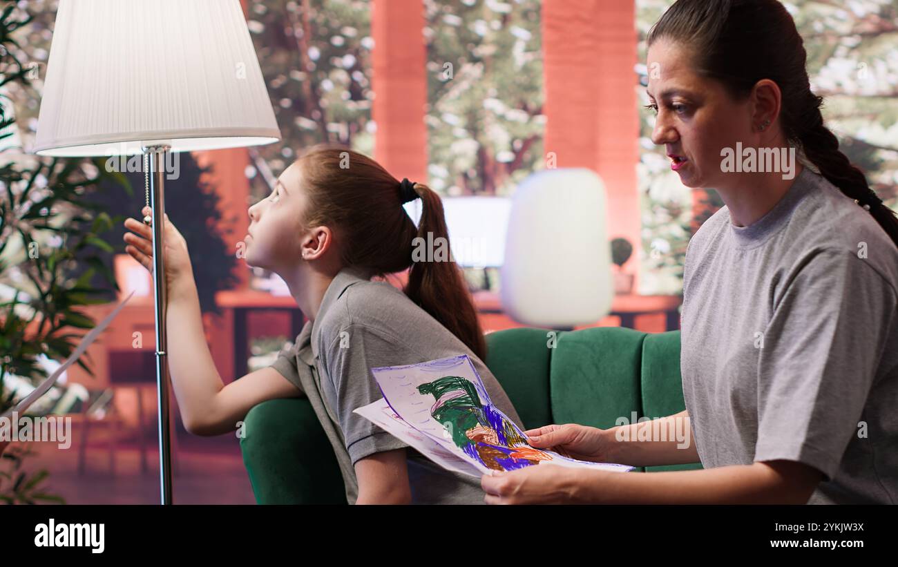 Therapist presenting unsettling dangerous drawings to mother, teen girl ...