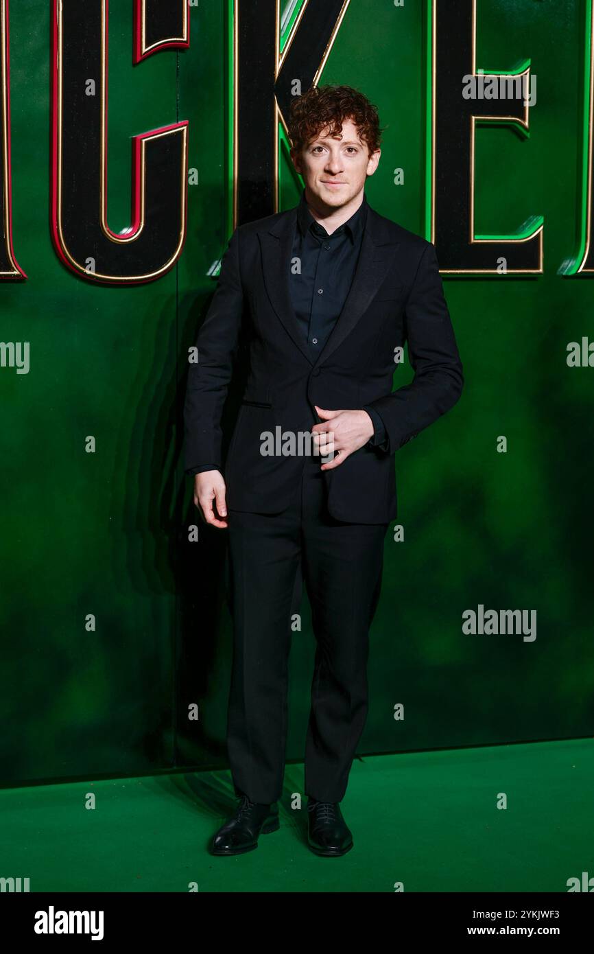 Ethan Slater poses for photographers upon arrival at the premiere of ...