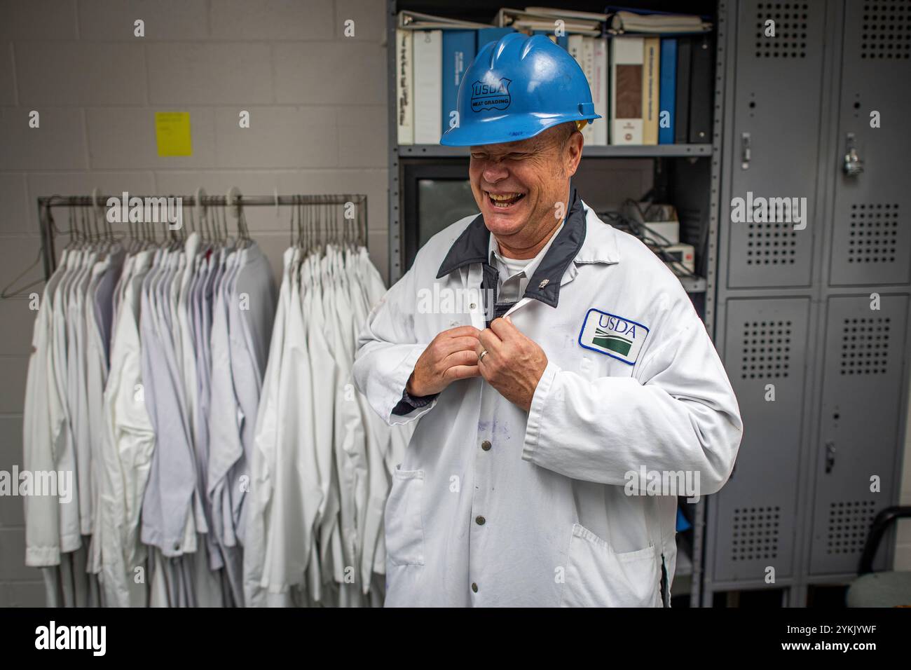 USDA agricultural meat inspectors inspect and grade beef at a ...