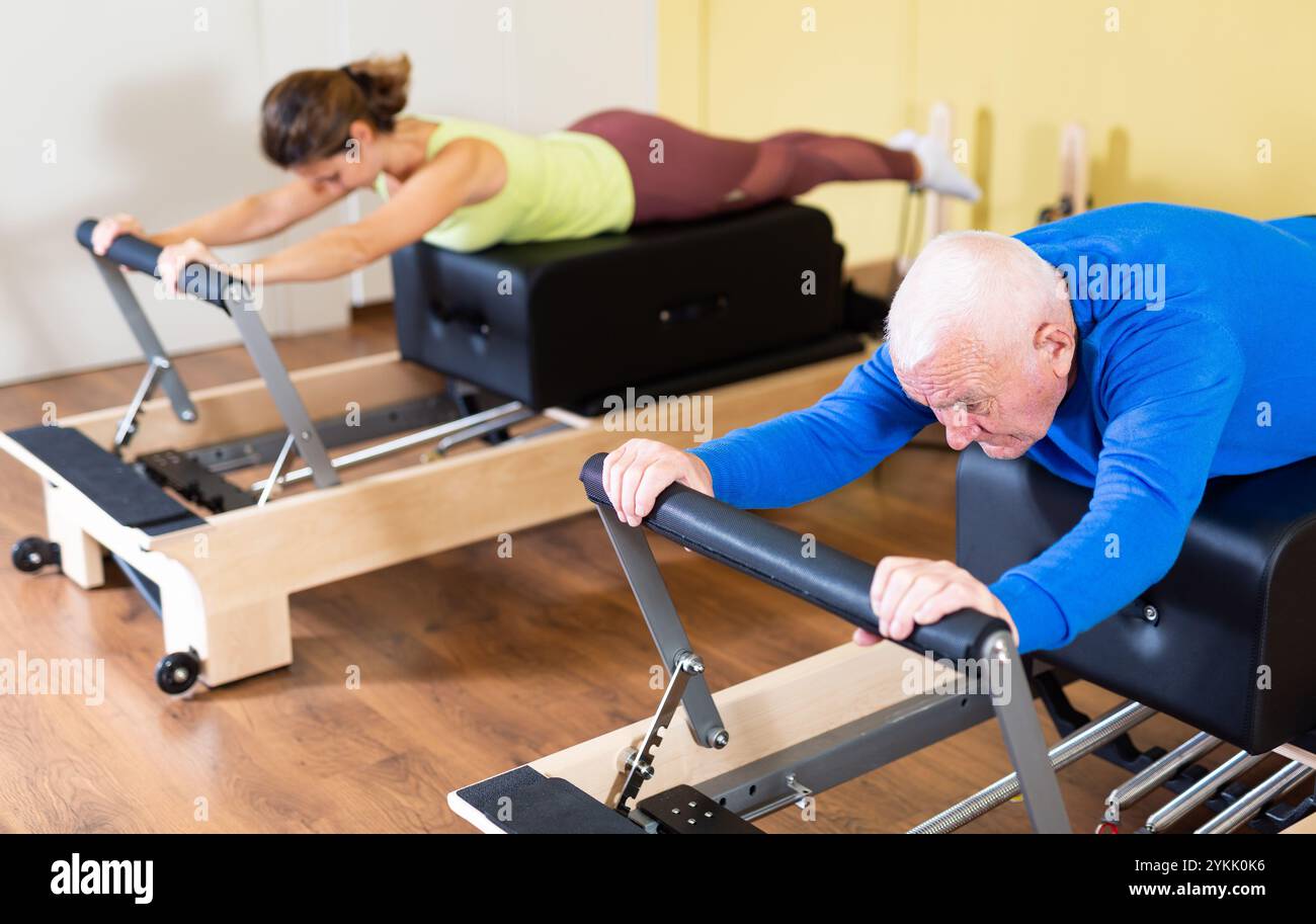 Elderly man performing exercises hi-res stock photography and images ...