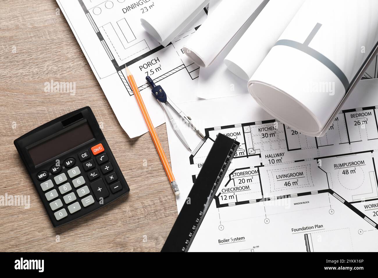 Different engineering drawings, ruler, pencil, calculator and dividers ...