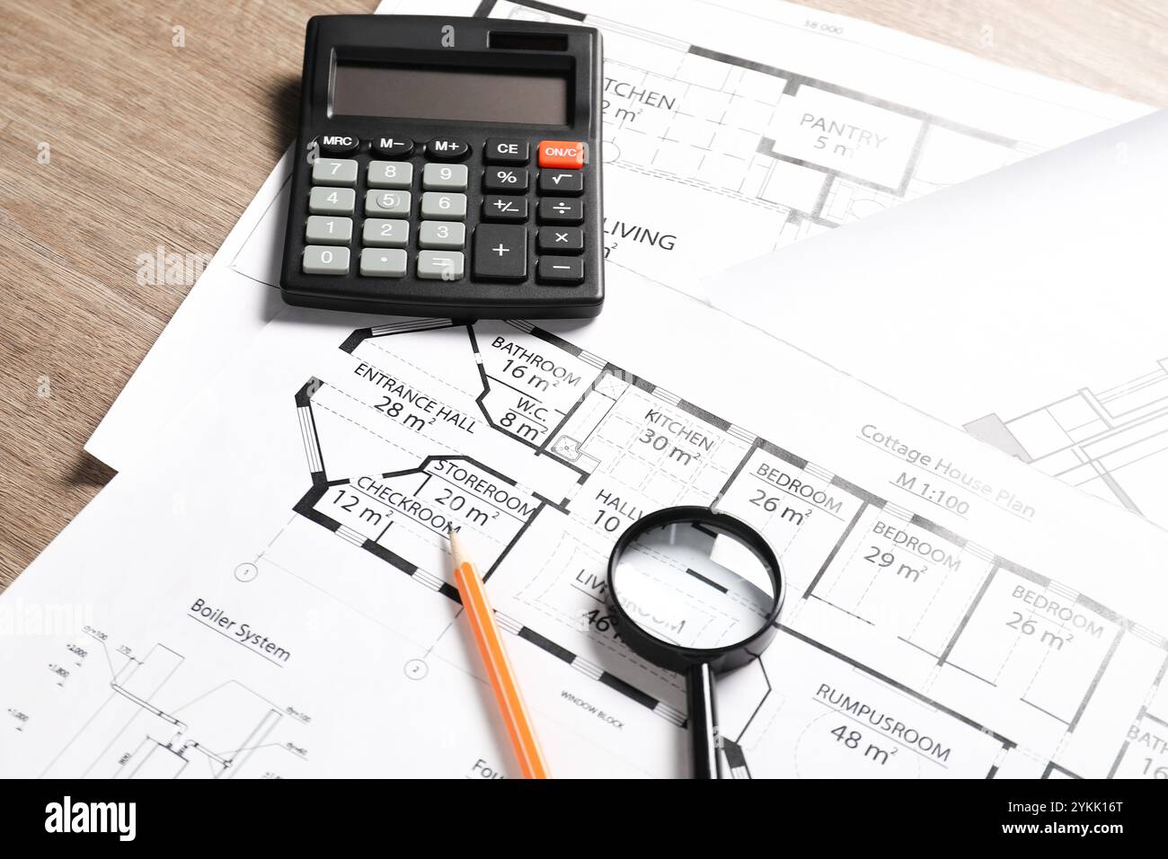 Construction drawings magnifying glass hi-res stock photography and ...