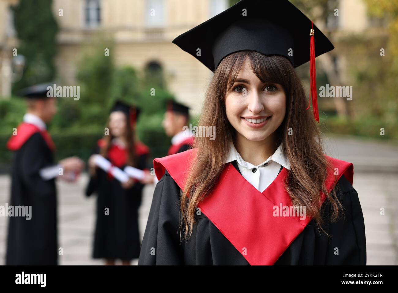 Graduation ceremony. Happy students outdoors, selective focus Stock ...