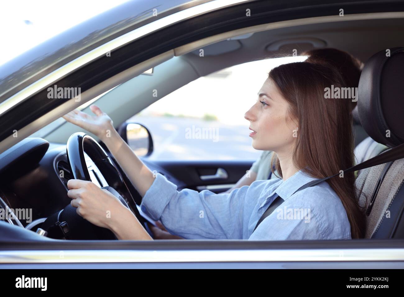 Driving school. Student passing driving test with examiner in car Stock ...