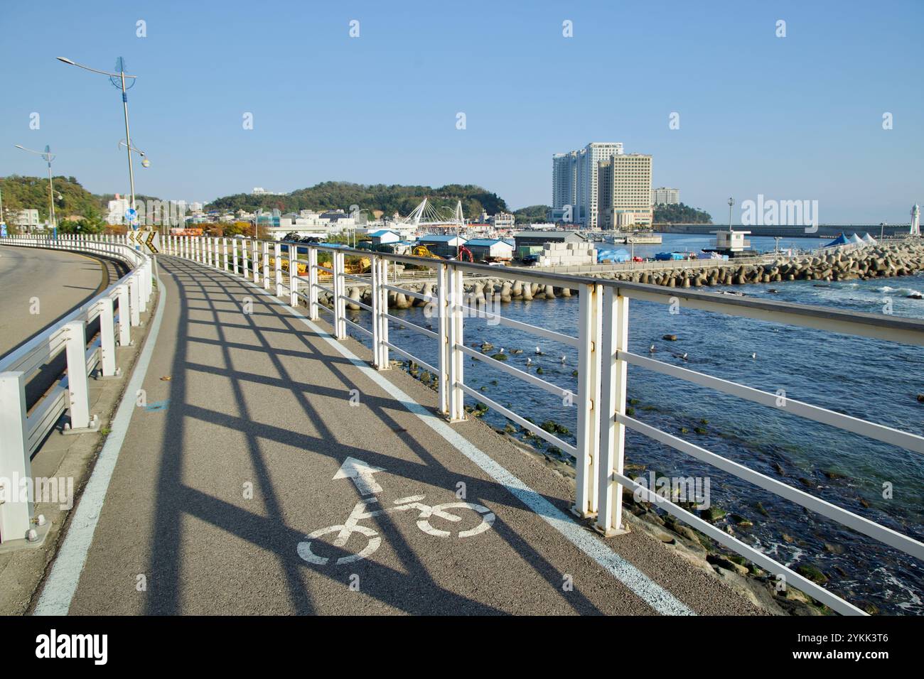 Sokcho, South Korea - November 3, 2024: A designated bicycle path runs ...