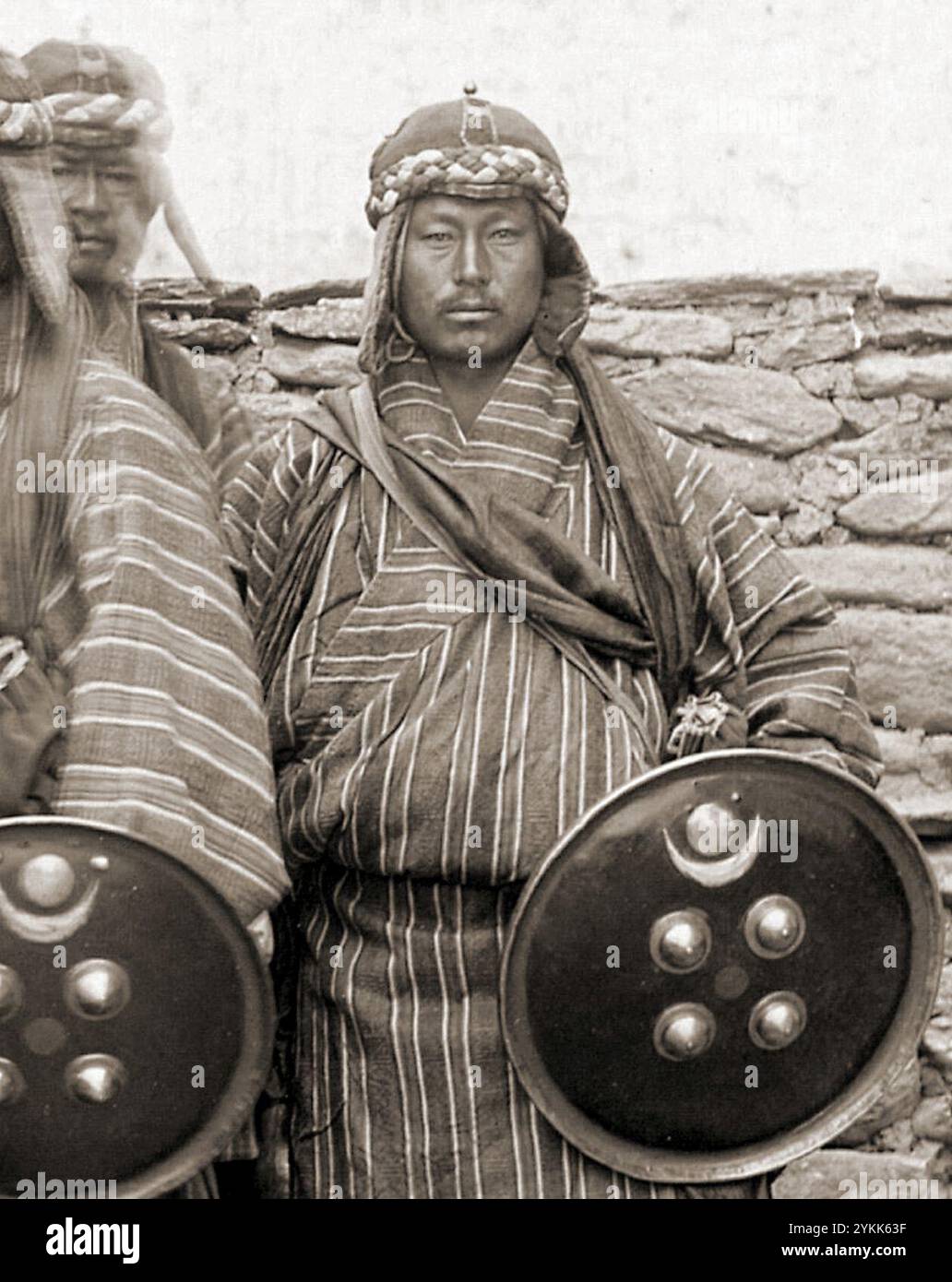 Bodyguard (far right) detail, from- Sir Ugyen Wangchuck, with his ...