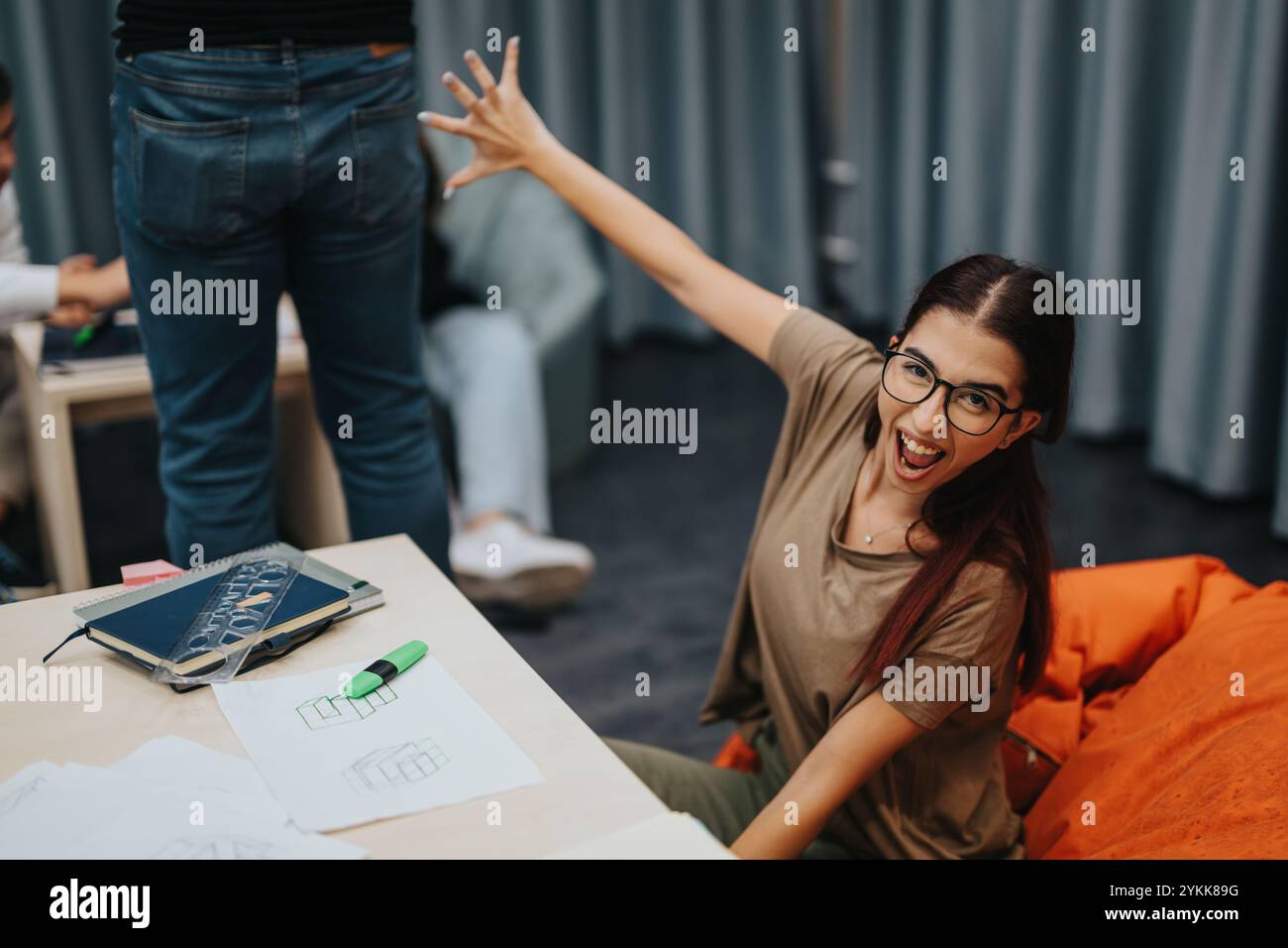 High school student joking around during a fun classroom moment Stock ...