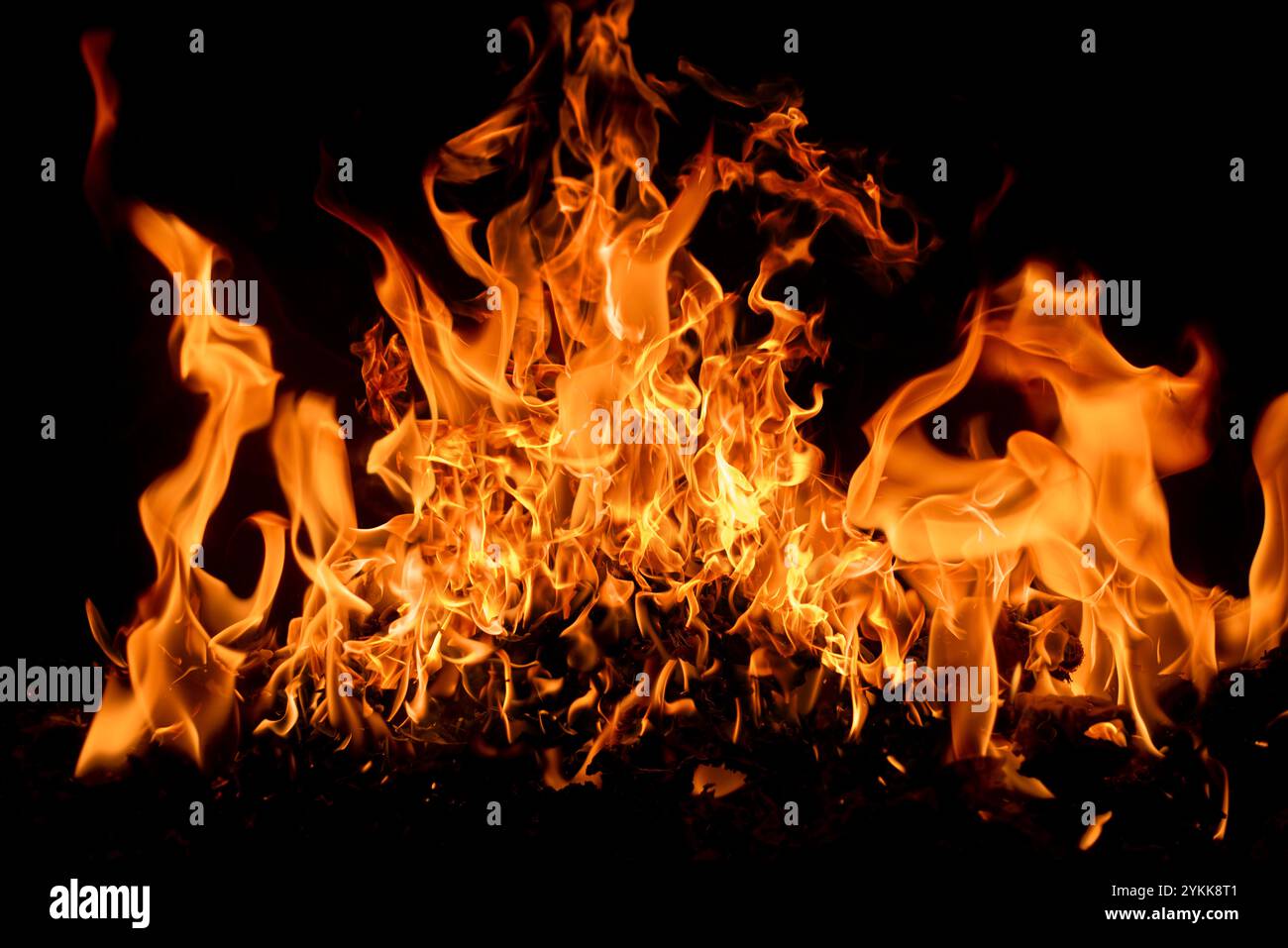 Fire flame background. Hell bonfire. Texture of fire on a black ...