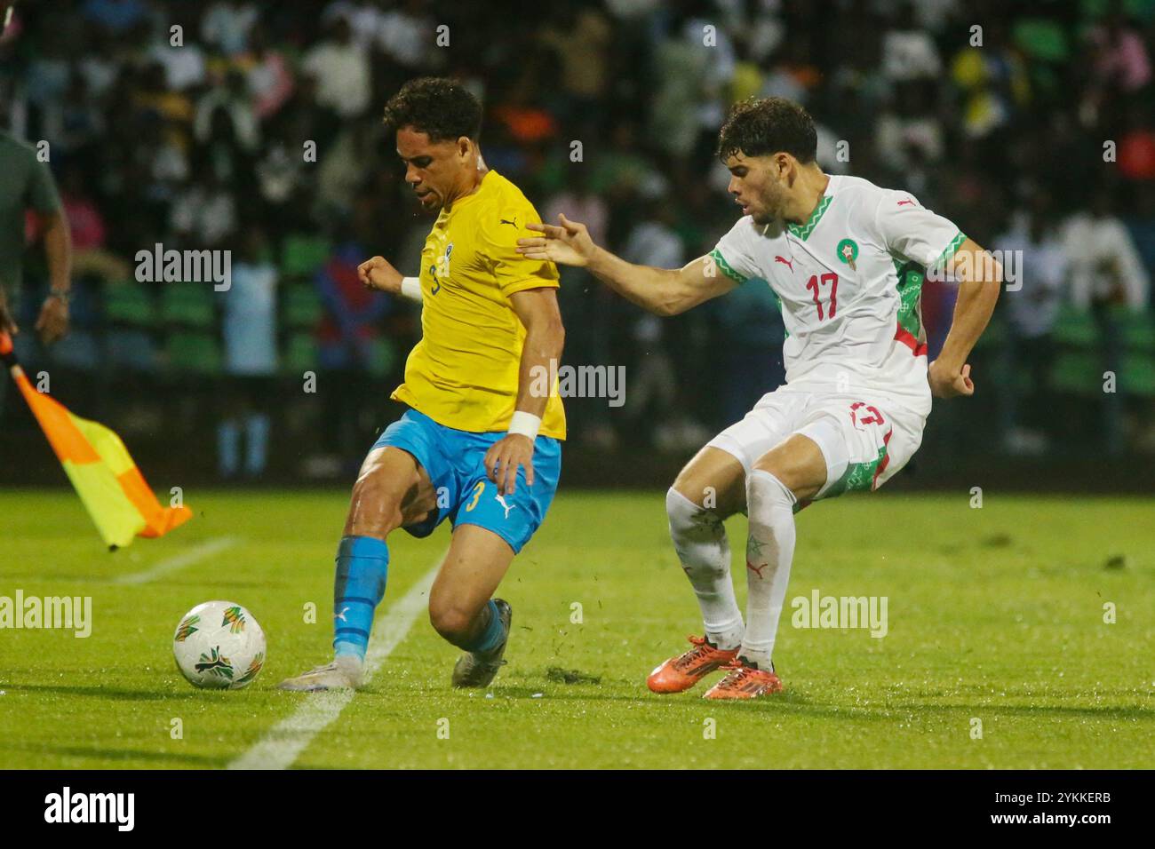 FRANCEVILLE, GABON - NOVEMBER 15: Anthony Oyono of Gabon and Abdessamad ...