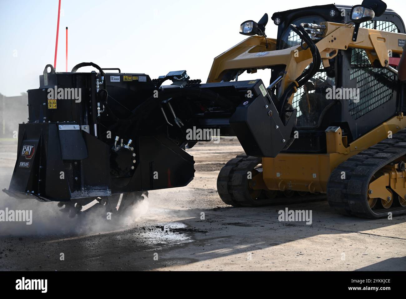 U.S. Airmen assigned to the 509th Civil Engineer Squadron use heavy ...
