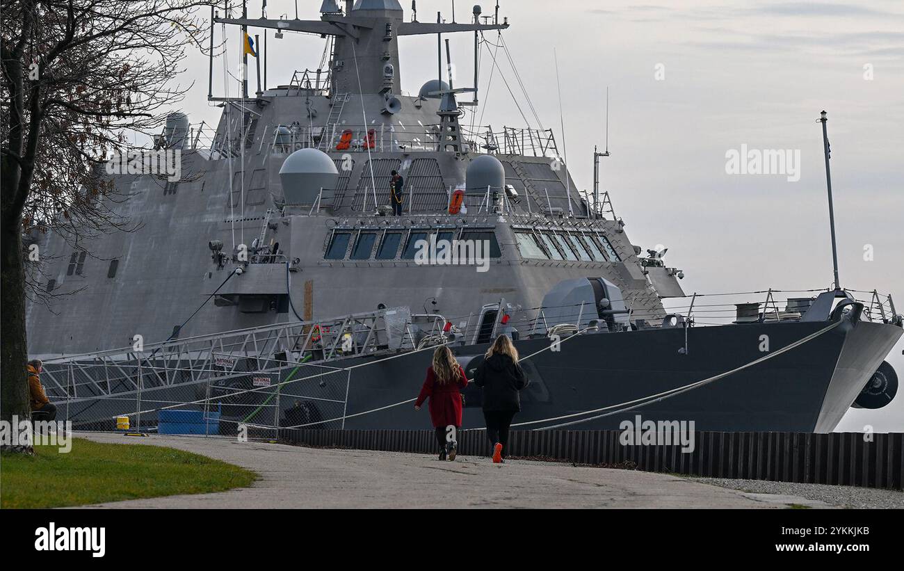 Pedestrians walk for a closer view of the USS Beloit (LCS 29) at ...