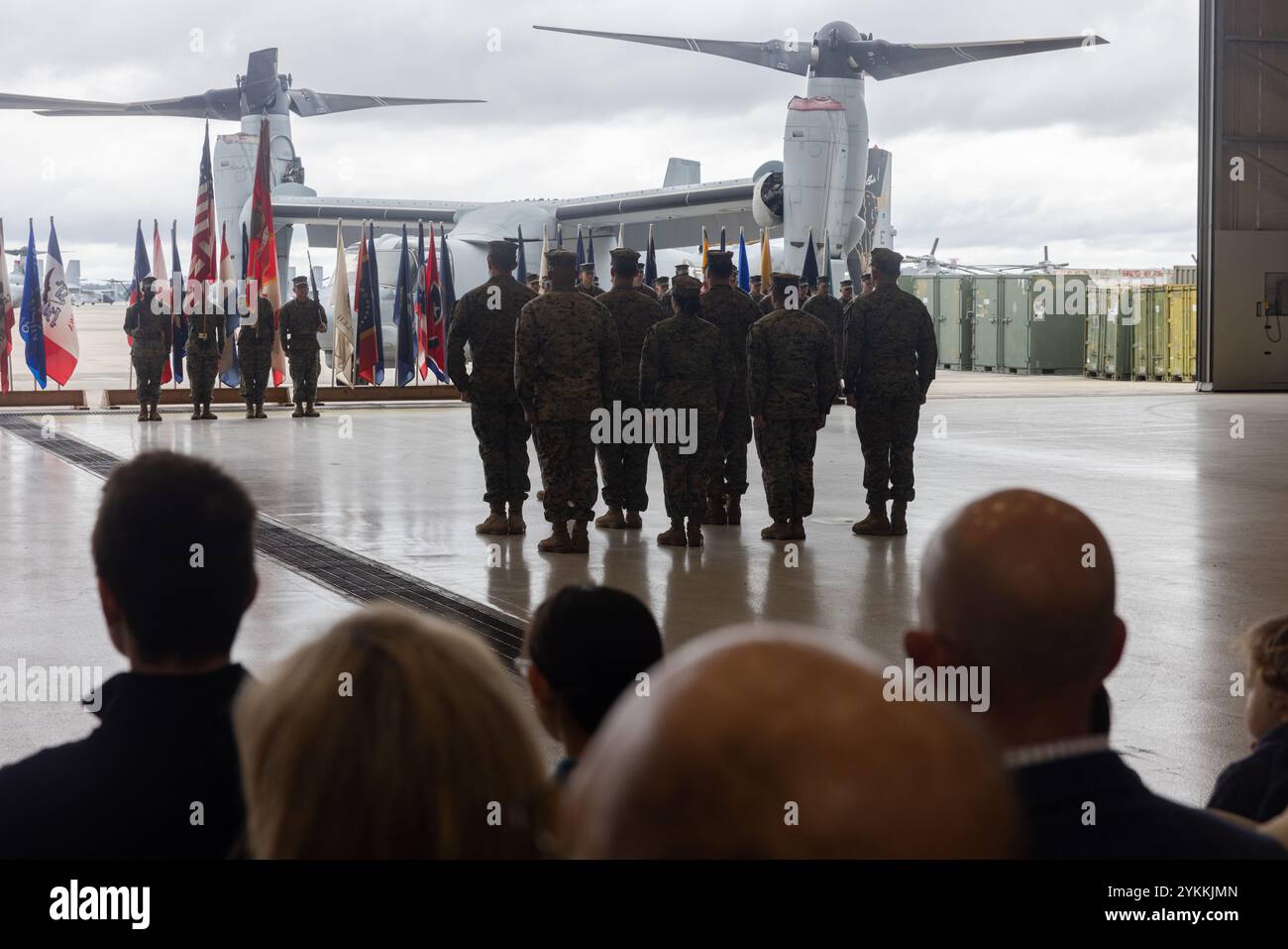 U.S. Marines with Marine Medium Tiltrotor Squadron (VMM) 261 stand in ...