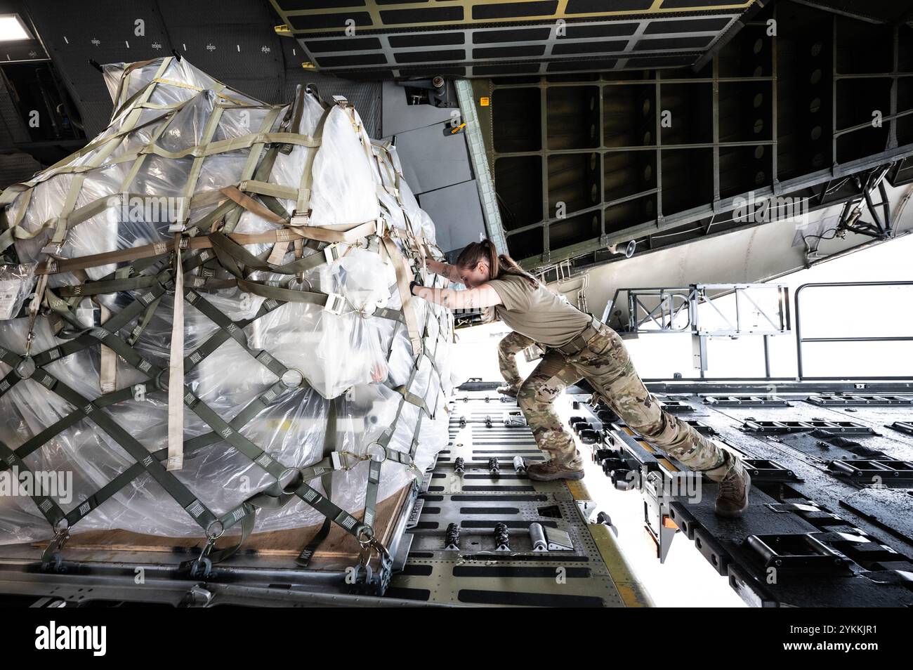 Senior Airman Jenna Hayes, a loadmaster assigned to the 709th Airlift ...