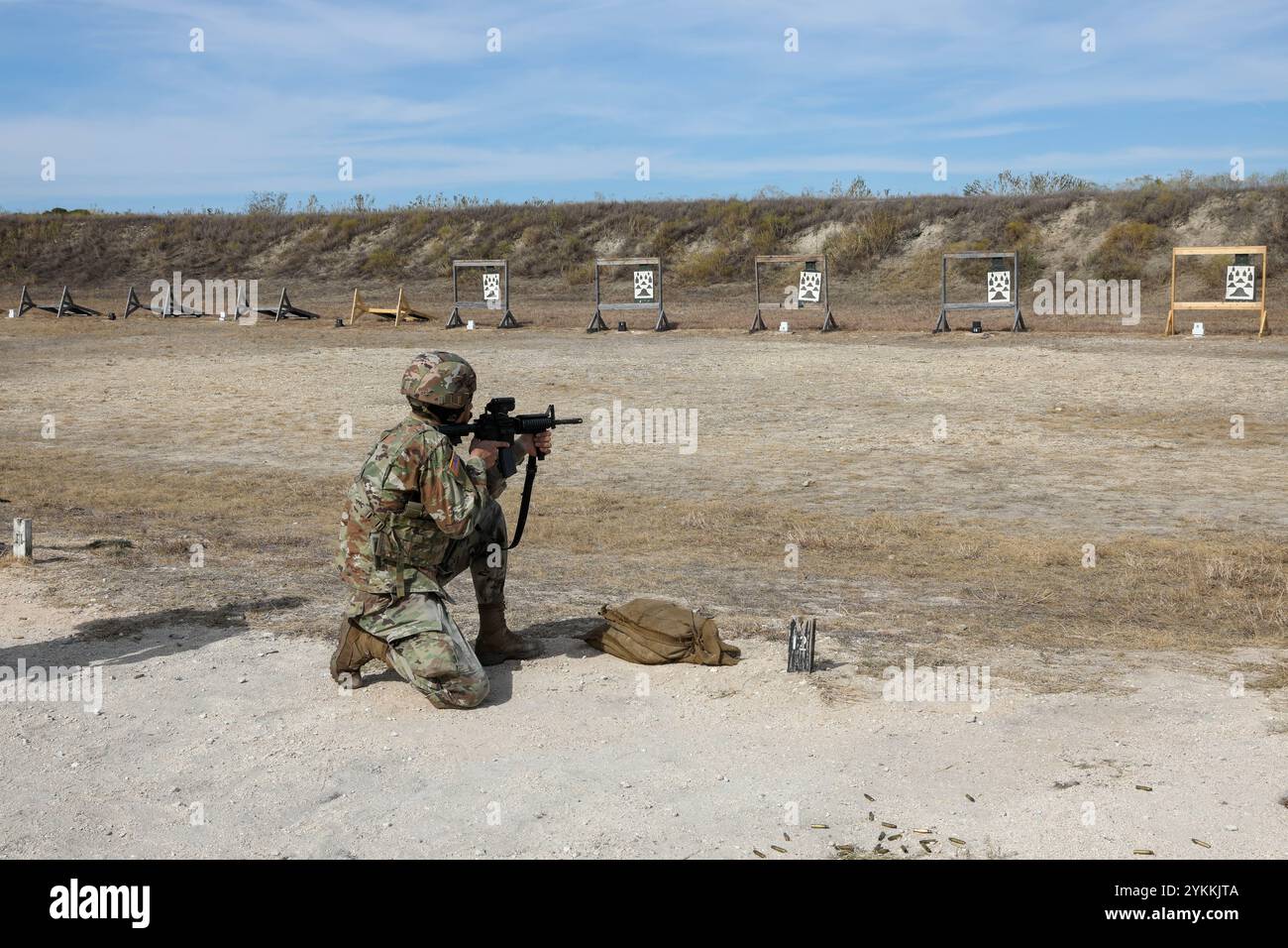 A U.S. Army Reserve soldier with 302nd Military Police Company shoots ...