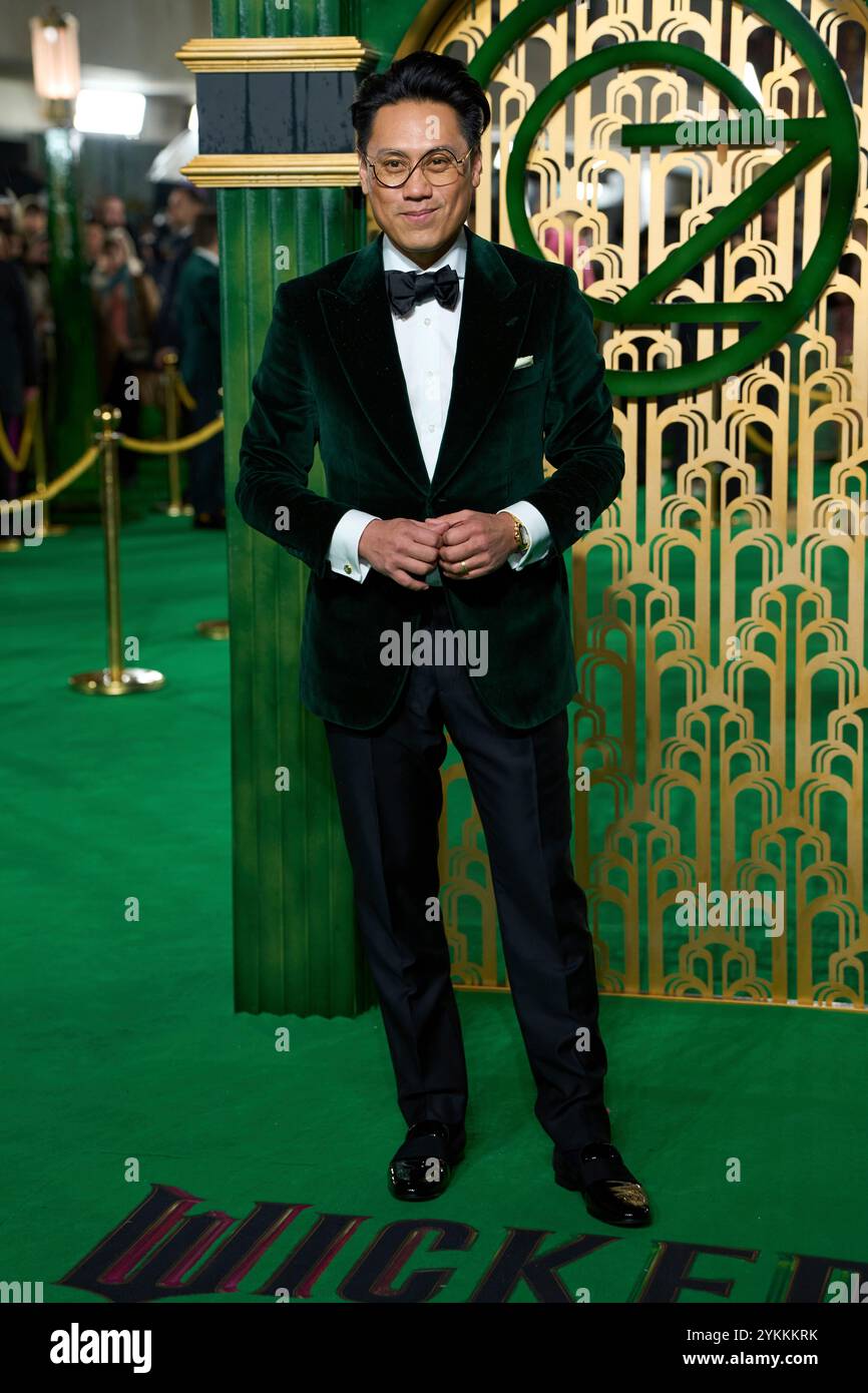 Director Jon M. Chu poses for photographers upon arrival at the premiere of the film 'Wicked' on ...