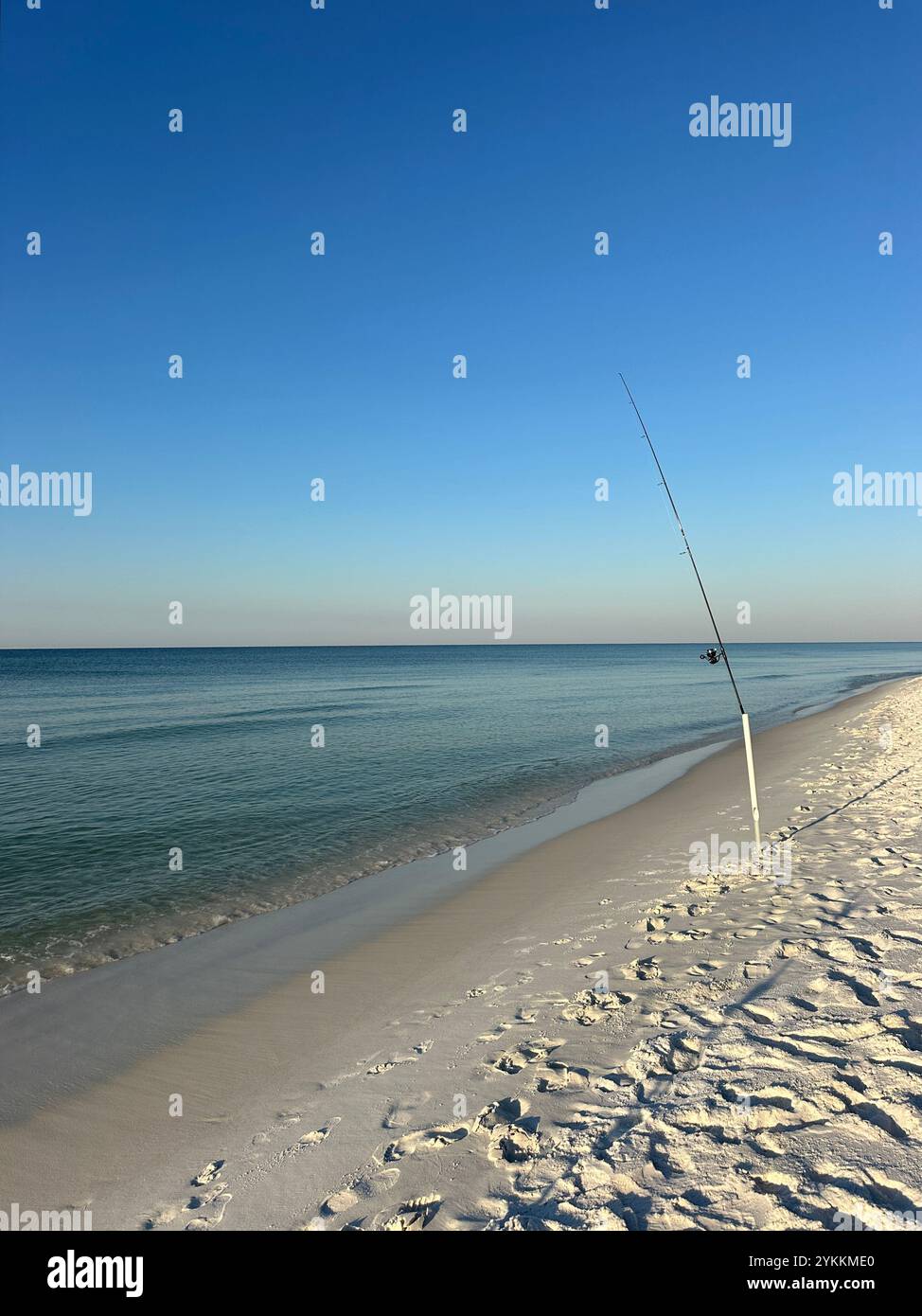 Fishing pole with Gulf of Mexico water views Stock Photo - Alamy