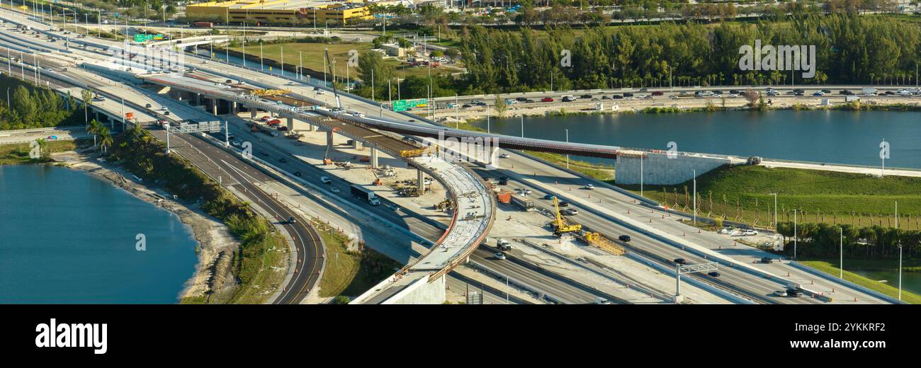 Aerial view of busy american freeway road interchange under ...
