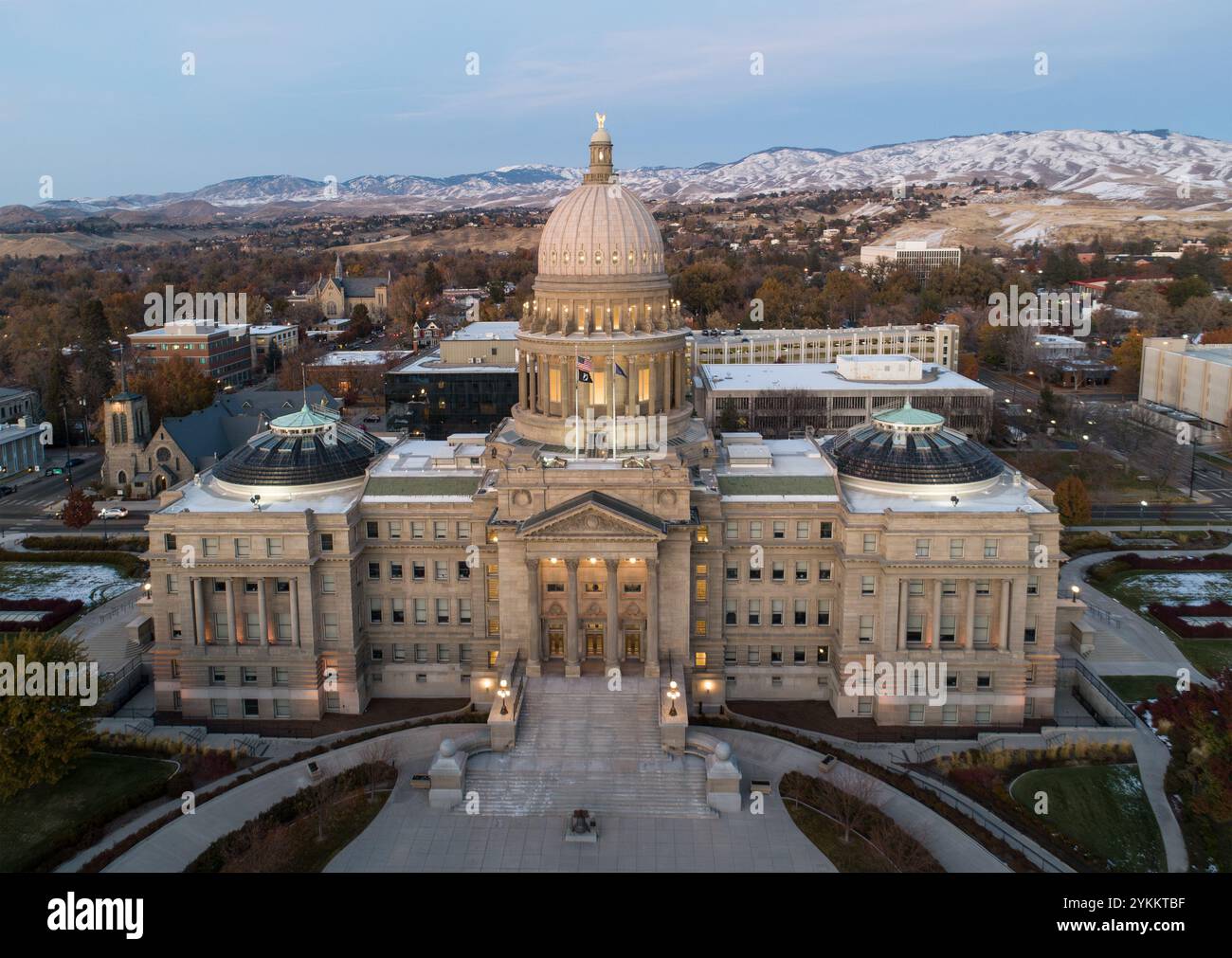 The Capitol building is a large, ornate structure with a dome on top ...