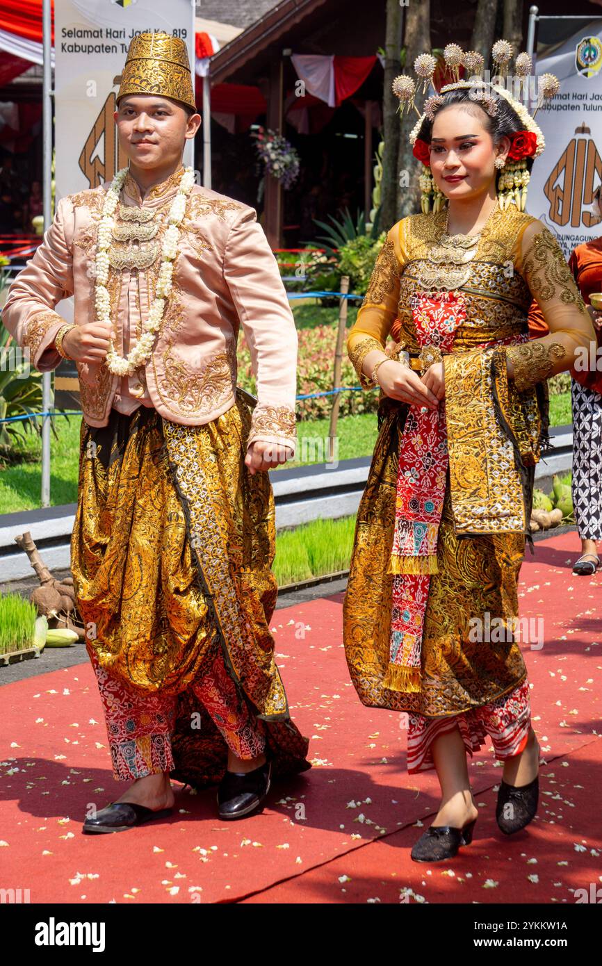 Indonesian with Javanese traditional costume Stock Photo - Alamy