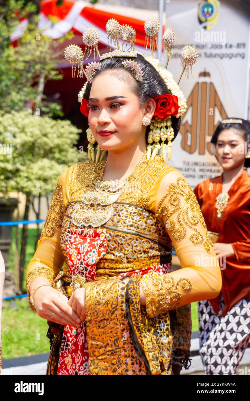 Indonesian with Javanese traditional costume Stock Photo - Alamy