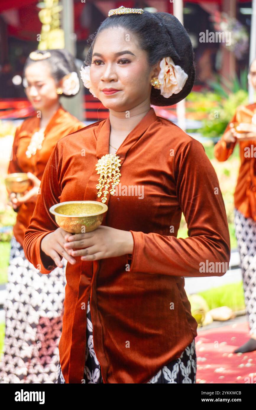 Indonesian with Javanese traditional costume Stock Photo - Alamy