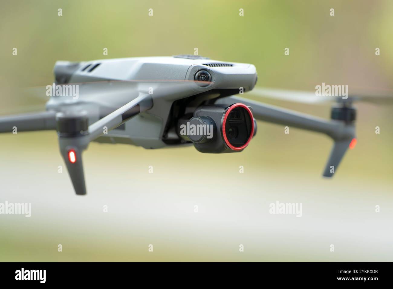 Drone quadcopter with digital camera and fast rotating propellers ...