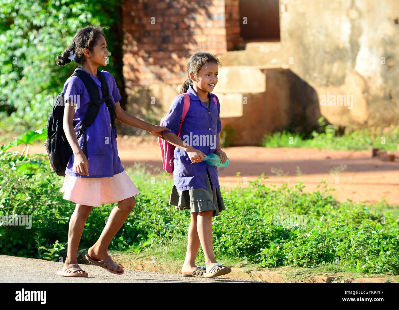 Malagasy School girls walking back home in a small town in the Central ...
