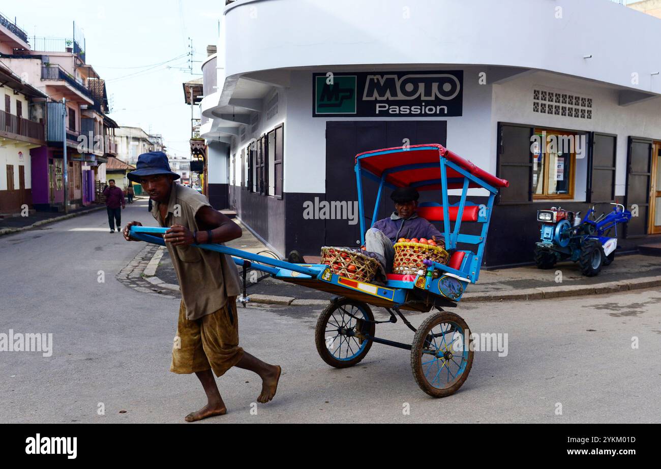 A pousse pousse in the streets of Antsirabe, Madagascar Stock Photo - Alamy