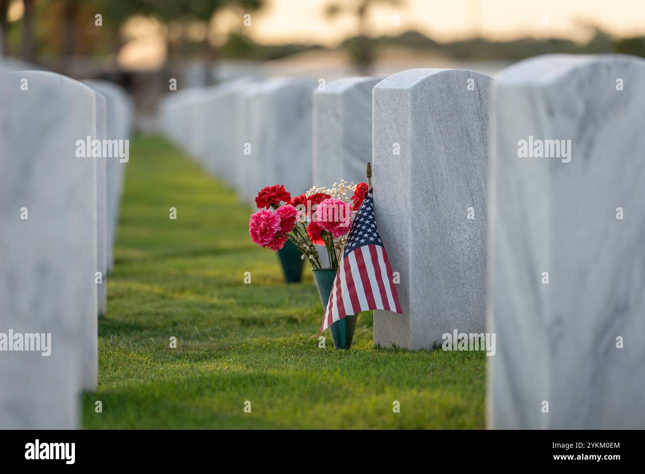 Military burial headstones. Sarasota National Cemetery with rows of white tomb stones with ...