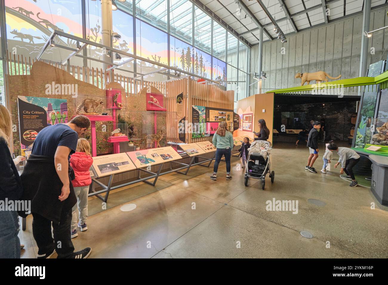 Kids and families enjoying the exhibit. In the section on local California history, subjects at ...
