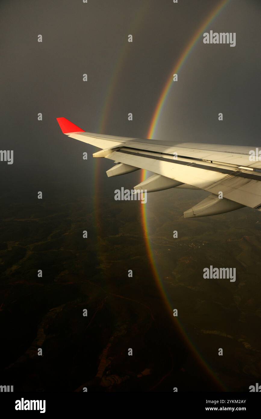 A double rainbow seen from an Air Mauritius plane flying over Madagascar Stock Photo - Alamy