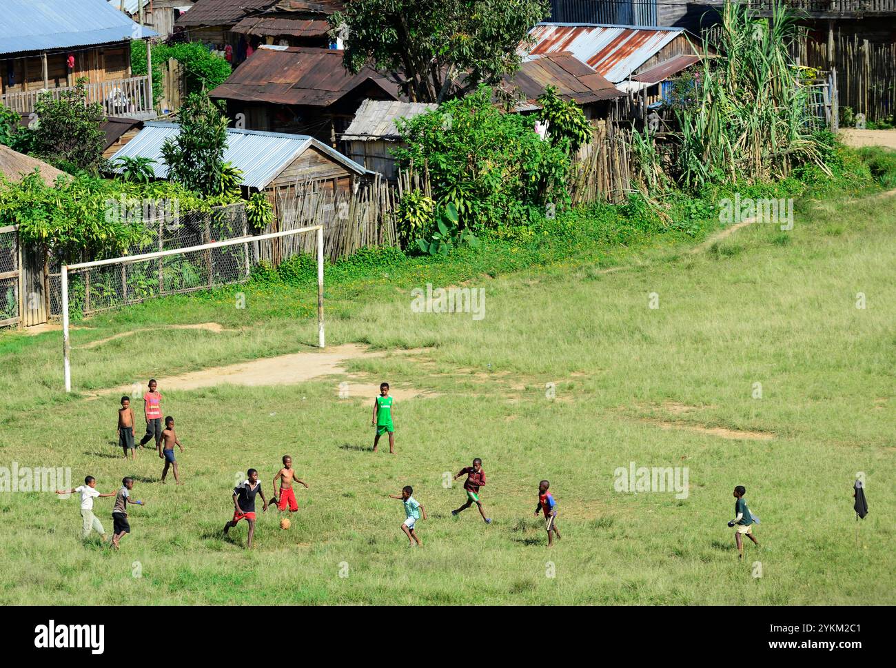 Young Malagasy children playing football / soccer in Andasibe village ...