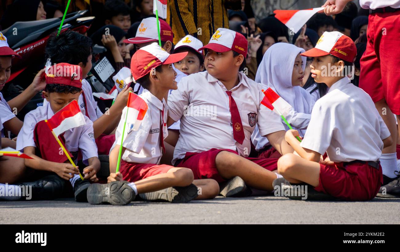 Indonesian elementary school students with uniform bring indonesian ...