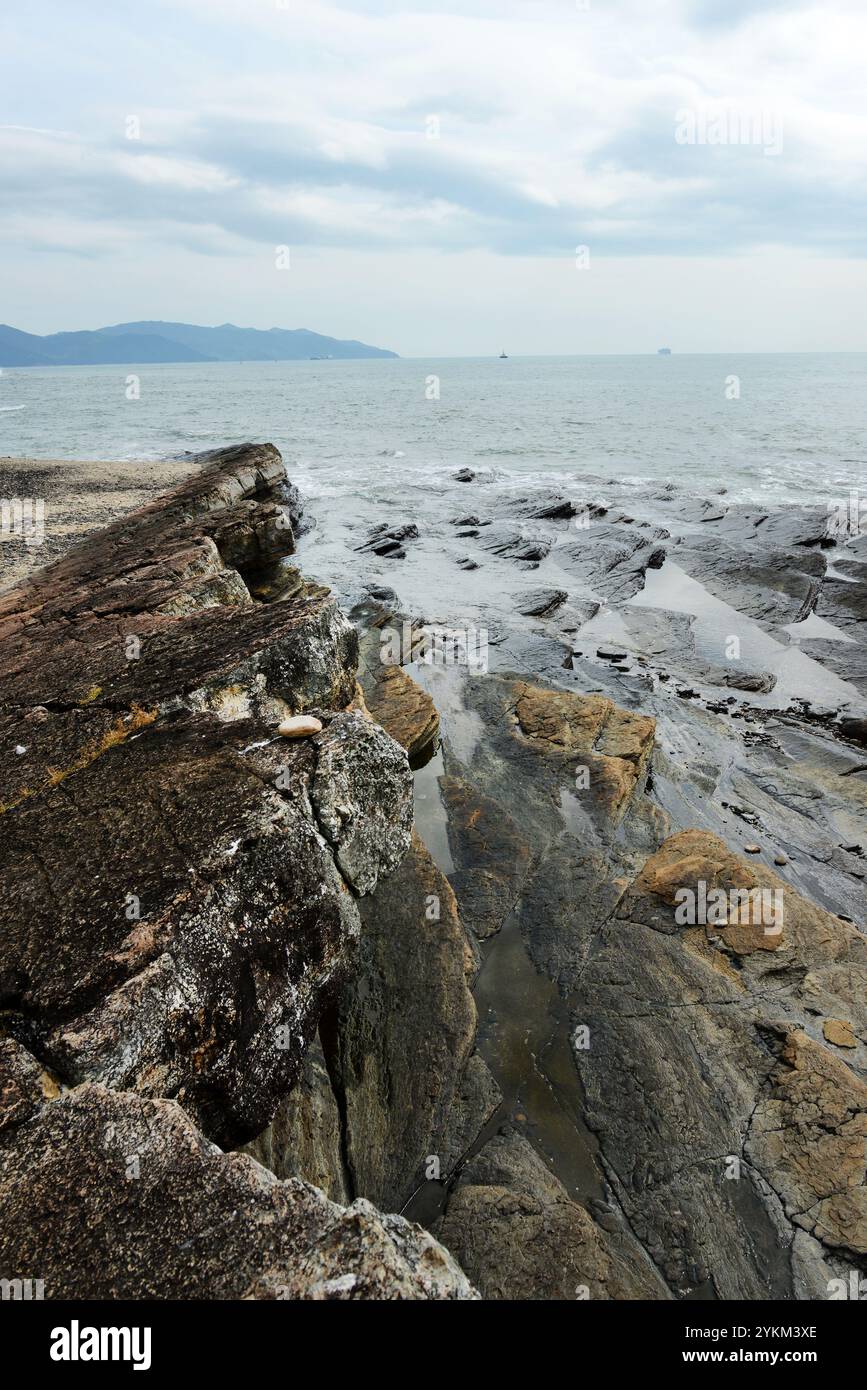 Beautiful rock formation on the beach in the western coast of Tung Ping ...