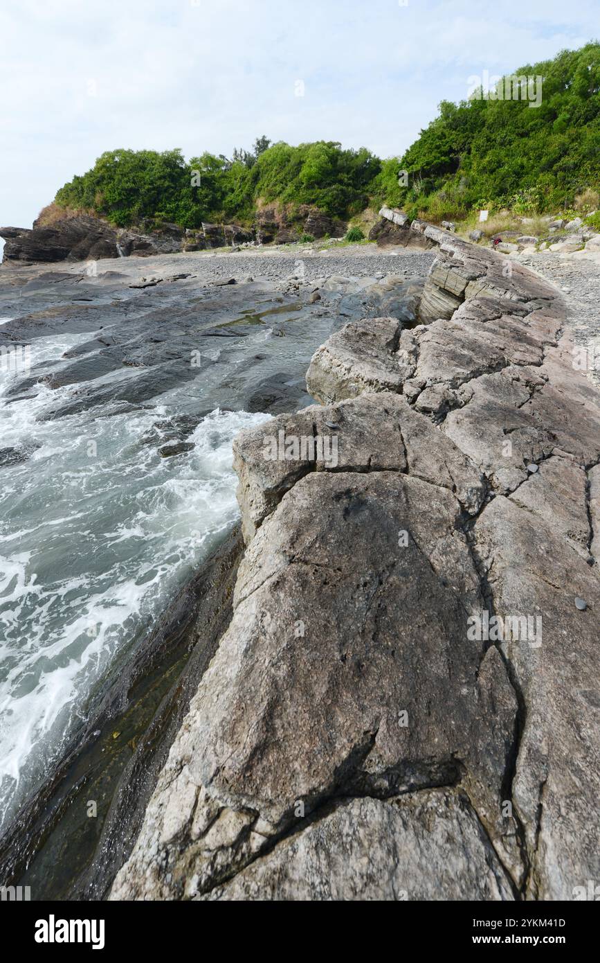 Beautiful rock formation on the beach in the western coast of Tung Ping ...