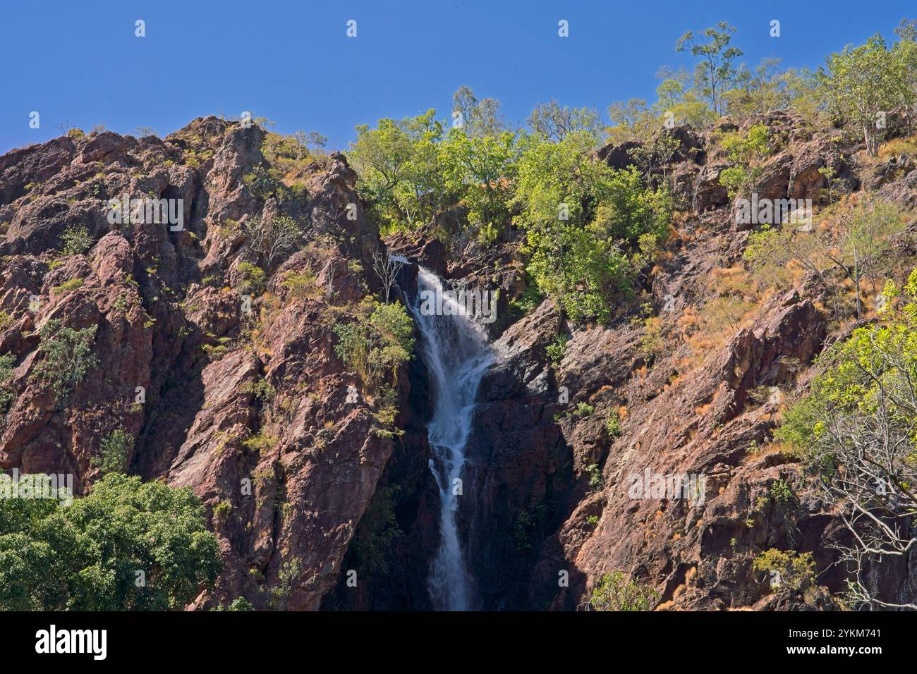 The Wangi Falls a popular swimming spot, has two misty waterfalls ...