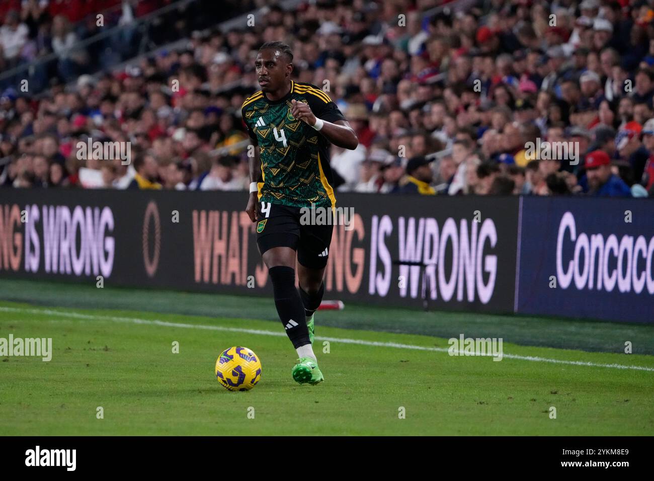 Jamaica's Amari'i Bell brings the ball down the pitch during the first ...