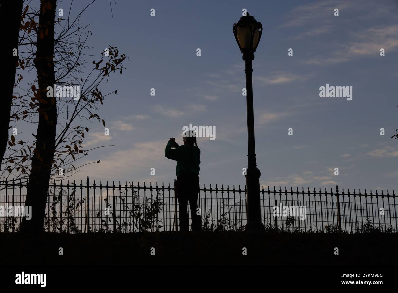 People take photos of the Jacqueline Kennedy Onassis Reservoir Central ...