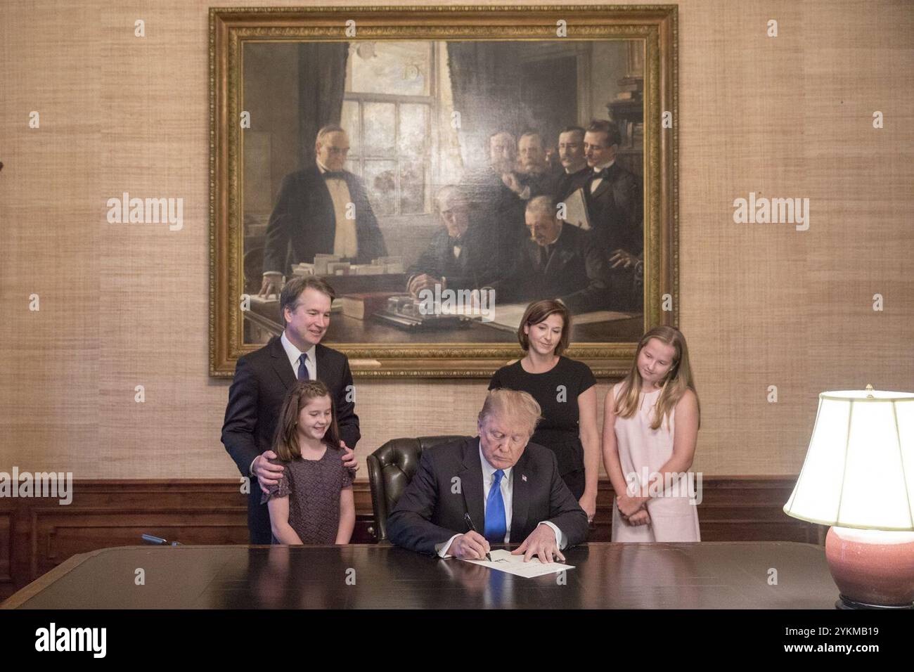 Brett Kavanaugh watches with his family as President Donald Trump signs ...