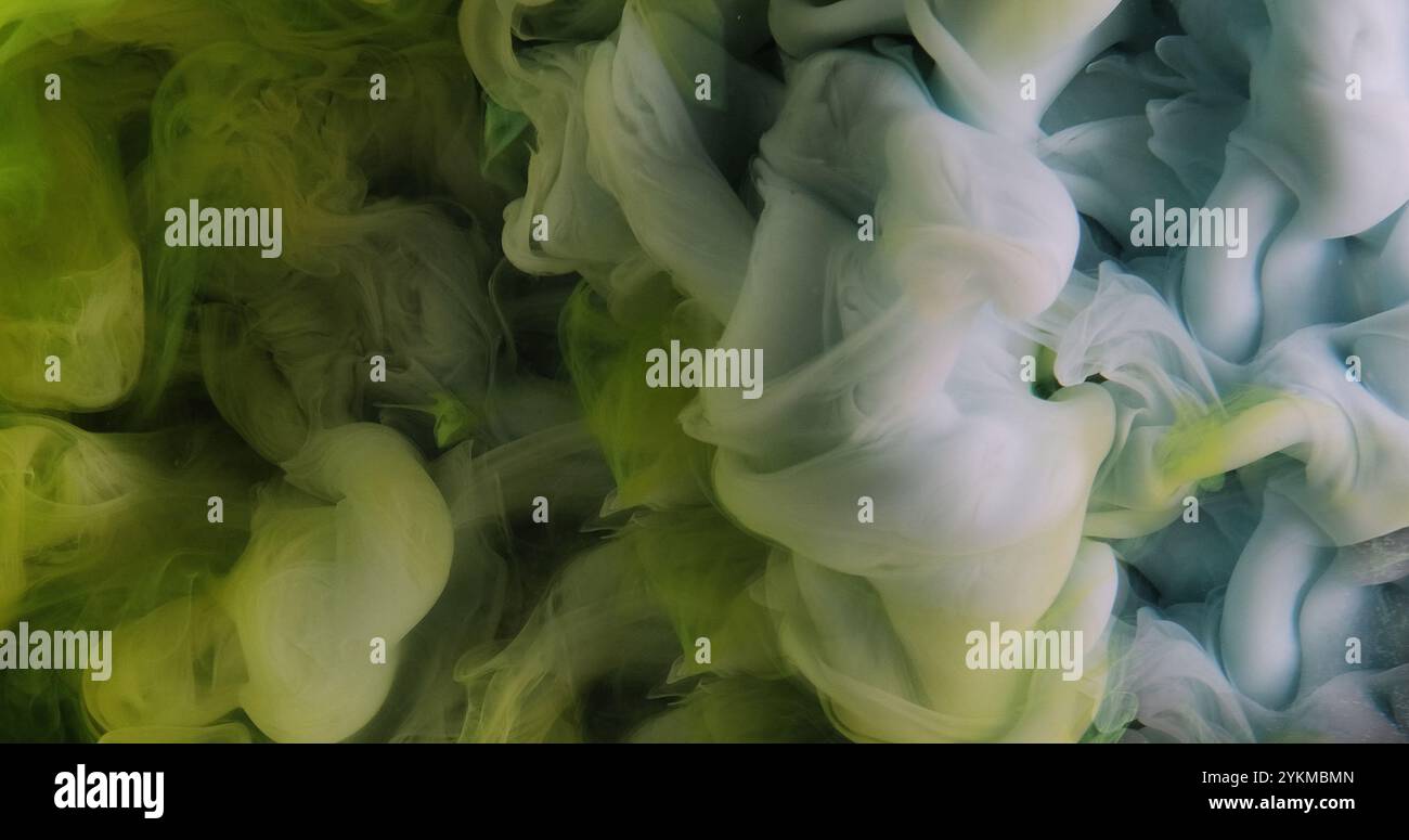 Paint drop. Smoke wave. Green blue color ink water fume blend flow on ...